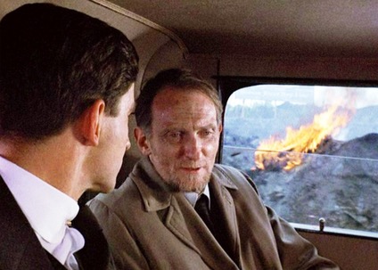 Gatsby's father and Nick on the way to the funeral.