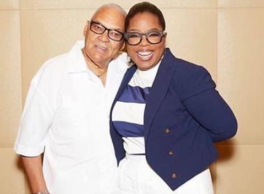 A picture of Lawrence as an adult with Oprah Winfrey