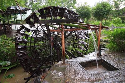 A Chinese water wheel, invented during the Han Dynasty.