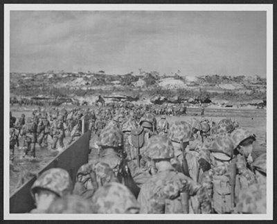 Allied forces arriving at Okinawa on boat.