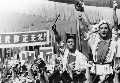 Students revolting and holding "red books", showing the power of Mao's ...