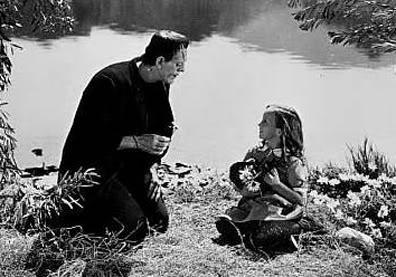 The creature and the little girl he saves; Credit: Geeks of Doom