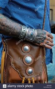 Martin accepts the importance of the medicine bag and proudly wears it.