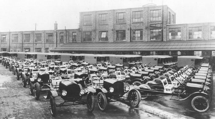 Here is an image that shows the mass production of automobile parts in ...