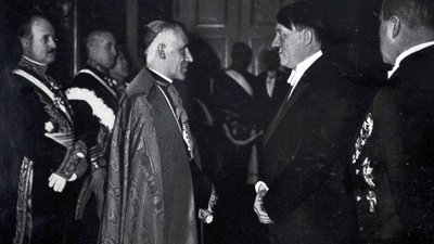 Adolf Hitler with the Vatican ambassador, Cesare Orsenigo, in 1935, two ...
