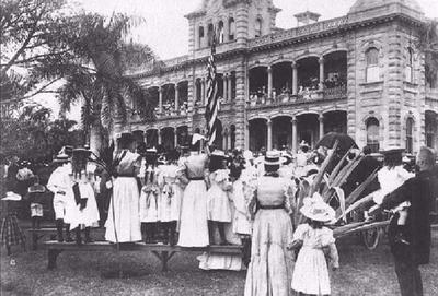 Spectators view as the American Government replaces the Hawaiian flag ...