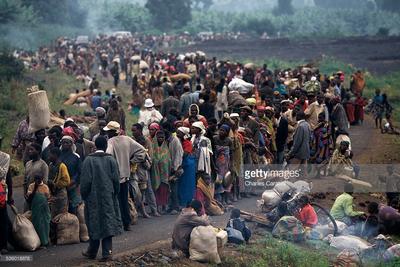July 13, 1994 Approximately one million people, mostly Hutu, begin ...