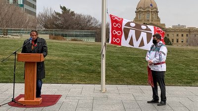 A picture of an Indigenous Relations Minister taking the podium at an ...