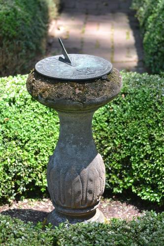 This sundial's gnomon is tilted, so that it can tell the time acurately.