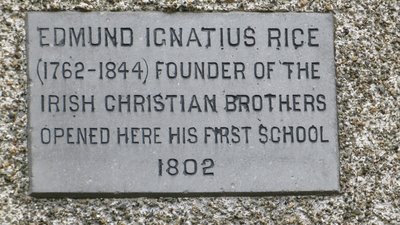 This plaque is still on the site of classes conducted in a disused ...