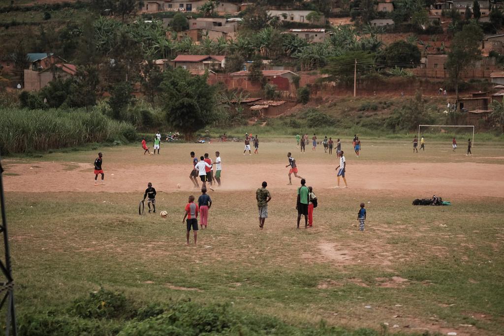 People playing football in Kigali, Rwanda. Photo by Brian Harries in ...