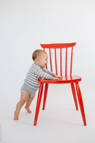 5 to 10 months: Stands with support and pulls self to stand