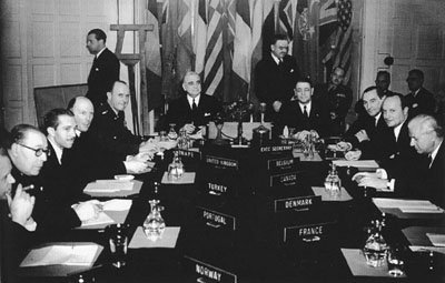 Representatives of the founding member countries of NATO, including ...