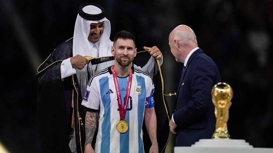 Pictured is Messi is crowned in a celebratory regalia called a Bisht ...