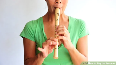 The left hand goes on the top of the recorder.