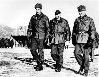 President Eisenhower visits Korea, fulfilling his campaign promise