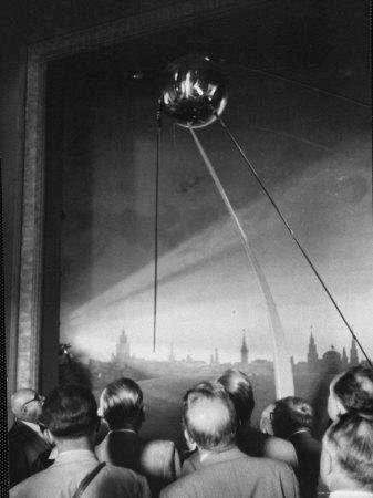 Scientists viewing Sputnik model at Igy Conference (International ...