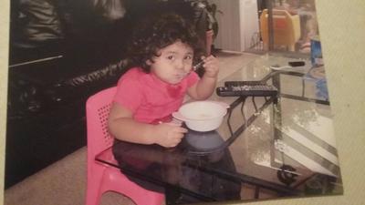 Me with my extremely curly hair :)