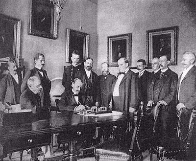 McKinley signing the peace treaty in Paris on December 10, 1898 after ...