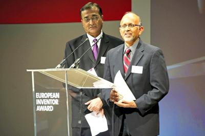 This is a picture of Ajay and one of his team mates being awarded for ...