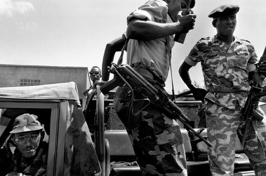 "Paul Kagame, left, the leader of the Tutsi-led Rwandan Patriotic Front ...