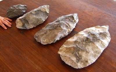 This is a stone with pieces chipped out it was a multi tool in those days