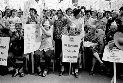 1982 Garment Strike union hats and raised picket signs to press for the ...