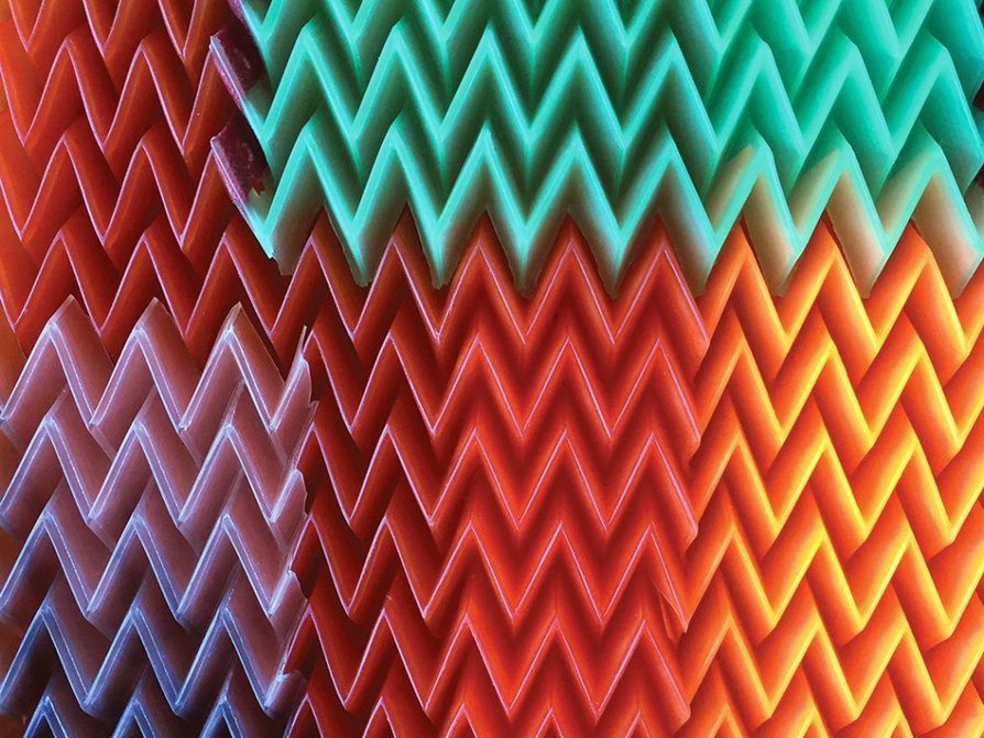Rubberized origami textile