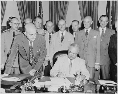 This is a picture of President Truman signing the Puerto Rico ...