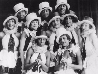 Elements such as beautiful showgirls with elaborate costumes, as well ...