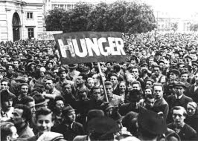 February 1931: food riots, men and women demolish grocery stores for ...