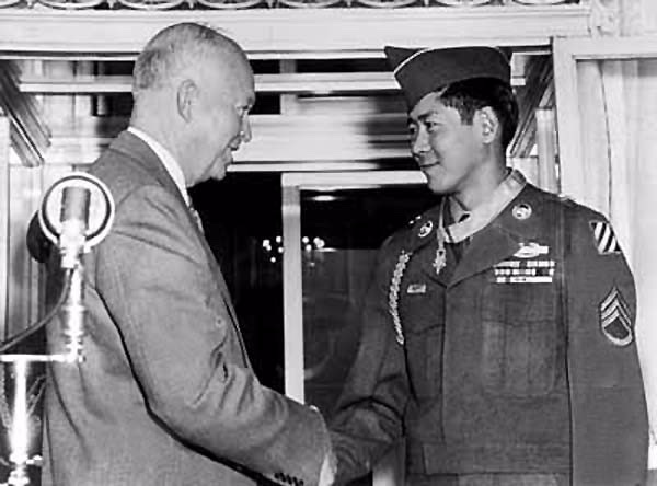 President Eisenhower congratulating Corporal Miyamura after he was ...